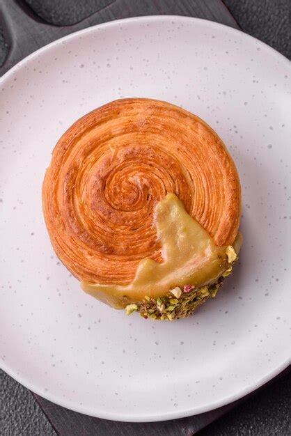 Premium Photo Round Puff Pastry Croissant With Raspberry Filling Or