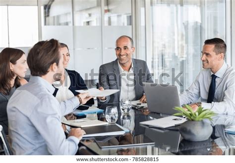 Passing Documents Over Desk Photos Images And Pictures Shutterstock