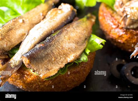 Tapas Bun Burger With Smoked Sardines Or Sprats Stock Photo Alamy