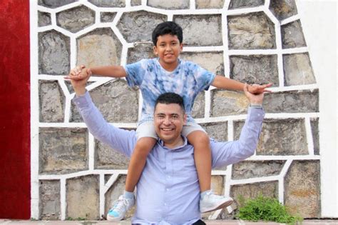 Divorced Dad With His 10 Year Old Latino Son Play And Spend Quality