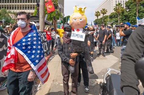 Protester Carrying A Doll During The No Kings Protest Against Government Policies Editorial