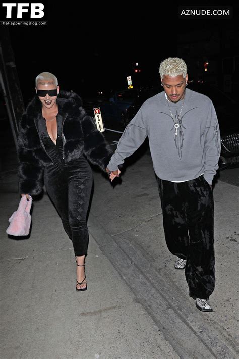 Amber Rose Sexy Seen Flaunting Her Hot Cleavage At Giorgio Baldi In