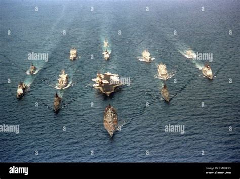 The Battleship Uss Iowa Bb 61 And The Aircraft Carrier Uss Midway Cv 41 Are Surrounded By