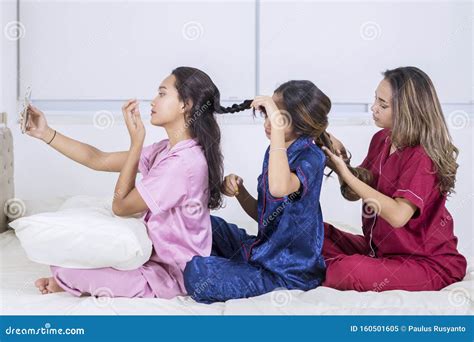 Pretty Girls Tying Hair To Each Other And Selfie Photo Cartoondealer