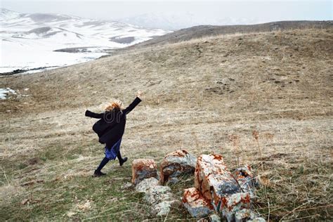 Woman Running Away In The Snow Landscape Stock Image Image Of Concept