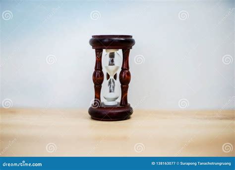 Hourglass On Wooden Table Dark Background Sand Falling Down Inside Of