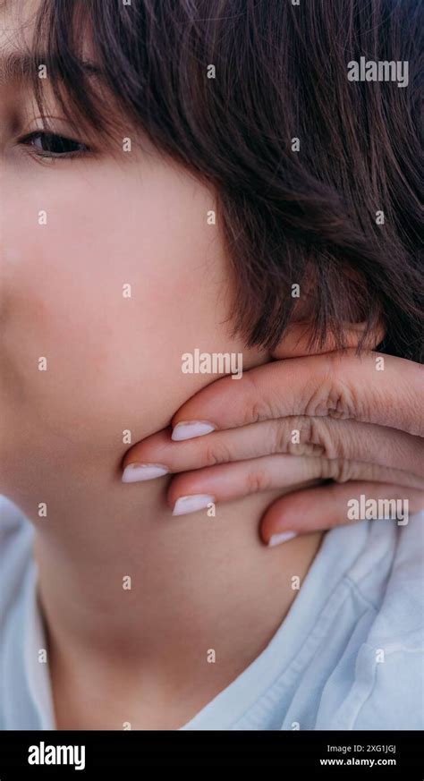 Paediatric Endocrinologist Examining Swollen Lymph Nodes Of A Young