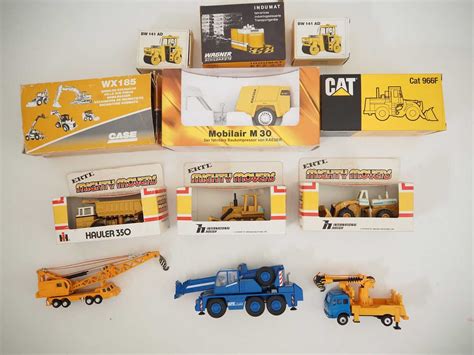 Lot 125 A Group Of Diecast Construction Equipment By