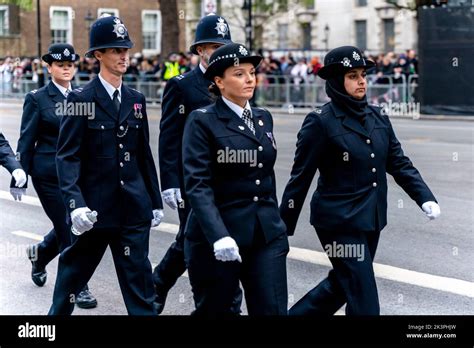 Metropolitan Police Officers Patrolling The Streets Before The Queens
