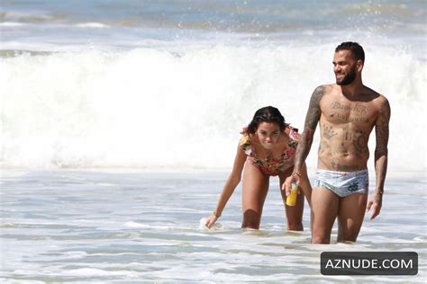 Daniel Alves And Spanish Model Joana Sanz Seen At Conceicao Beach In