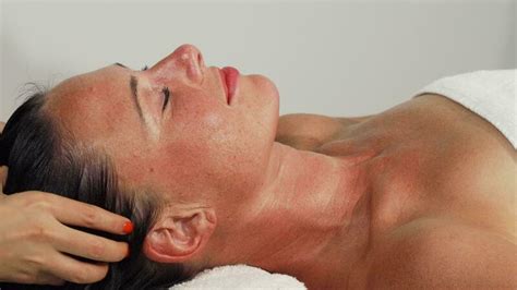 Happy Beautiful Mature Woman Smiling While Getting Head Massage