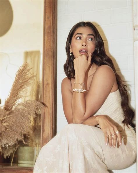 Sensational And Stylish Pooja Hegde Slays In Figure Hugging Ivory Gown