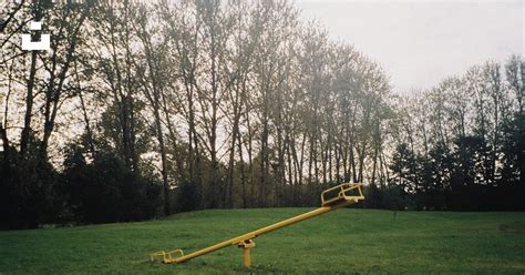 A Yellow Object In A Grassy Area Photo Free Latvia Image On Unsplash