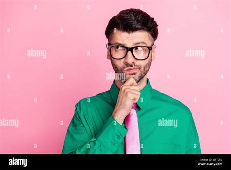 Photo Of Smart Clever Man Arm Touch Chin Have Question Doubt Unsure