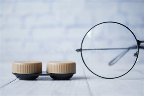 Close Up Of Contact Lens And Eyeglass On Table Stock Image Image Of