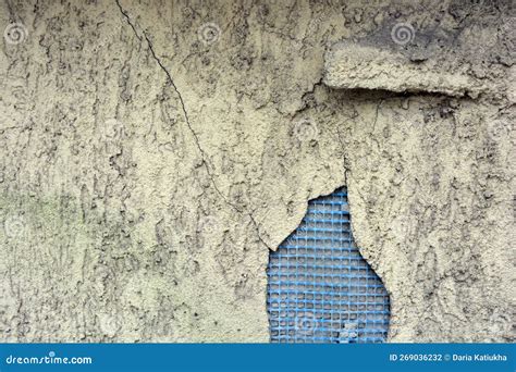 The Building Wall Cladding Is Made Of Brown Textured Structural