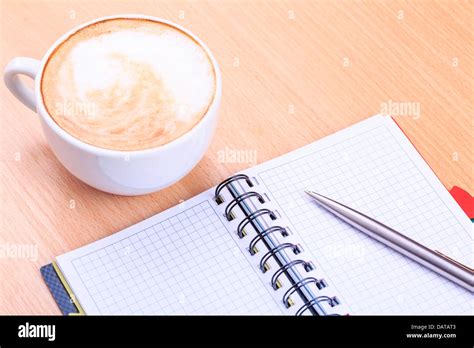 Open Blank Note Book With Coffee Cup And A Pen On Wood Table Stock Photo Alamy