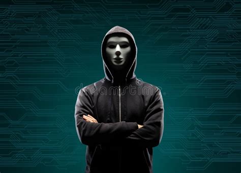 Computer Hacker In Mask And Hoodie Over Abstract Binary Background