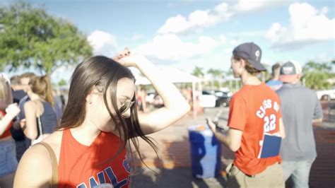 Static Shot Of College Girl Dancing And Blowing Kiss Clipstock