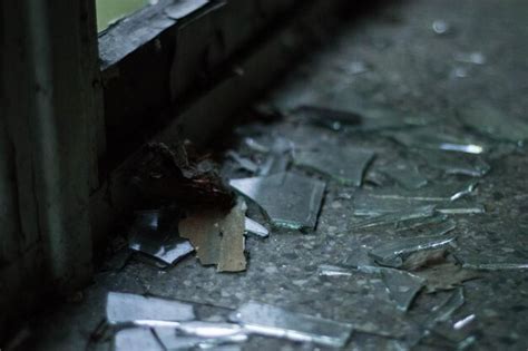 Premium Photo Close Up Of Broken Glass Pieces On Floor