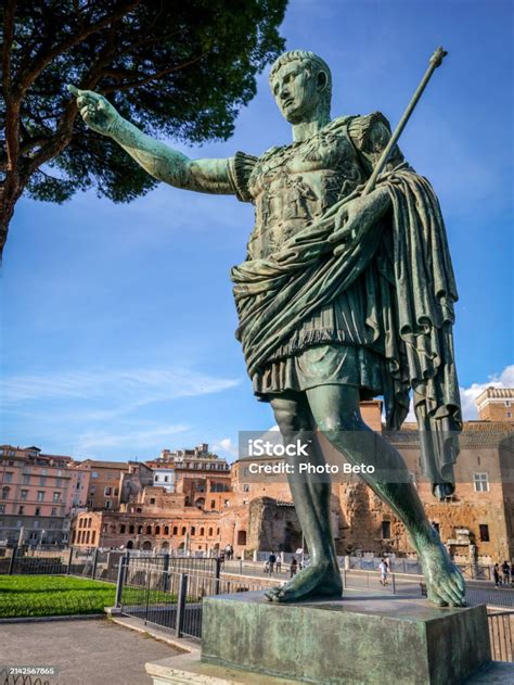 The Beautiful Bronze Statue Of Emperor Augustus In The Heart Of The