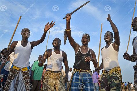 Members Of The Dinka Tribe Participate In A Traditional Celebratory