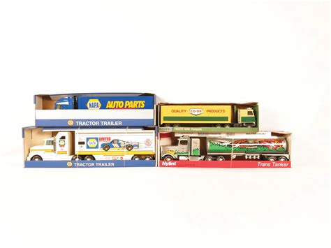 Three Nylint Tractor Trailers And An Ertl Tractor Trailer Auburn Memorabilia Auction Rm