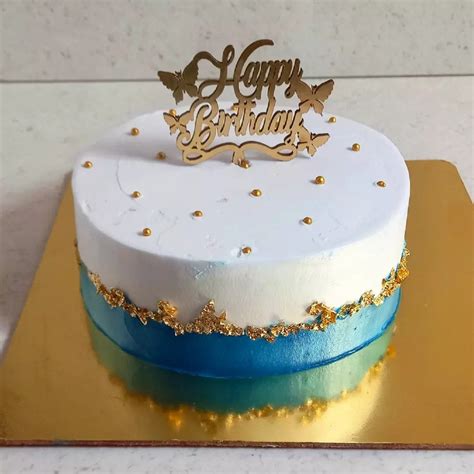 Minimalist Birthday Cake With Blue And White Design