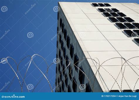 A Prison Building Called With Barbed Wire Fence Stock Photo Image Of