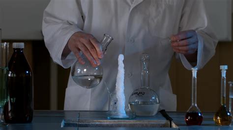 Scientist In A Laboratory Conducting An Experiment On The Instantaneous