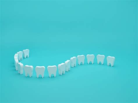 Premium Photo A Group Of Tooth On A Blue Background With A Tooth On