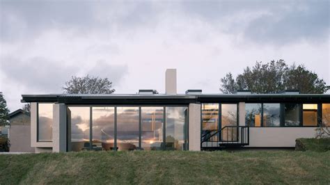 Arg Architects Updates Gridded Home In Iceland With Curving Walls