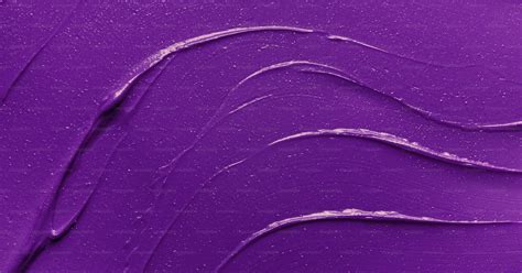 번지고 번진 생생한 레드 오렌지 산호 보라색 스칼렛 핑크 클라레 적갈색 질감 색조 또는 립스틱 멀티 컬러 배경 사진