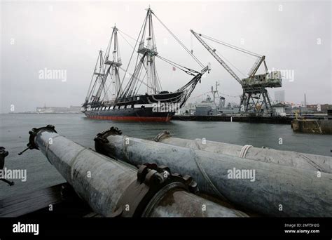 The USS Constitution Also Known As Old Ironsides Is Docked At The