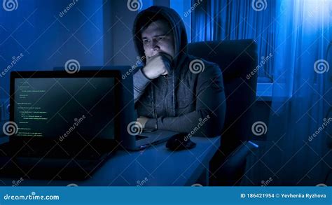 Thoughtful Programmer Brainstorming Ideas About Coding Stock Photo