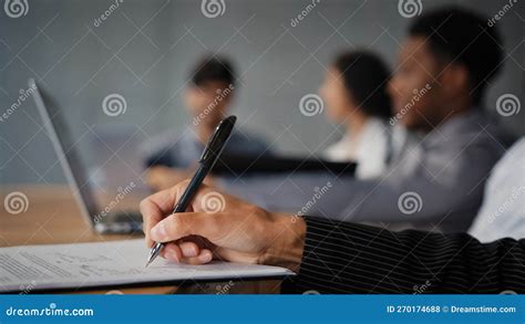 Close Up Female Hand Writing Notes On Paper Signing Document Contract Unrecognizable