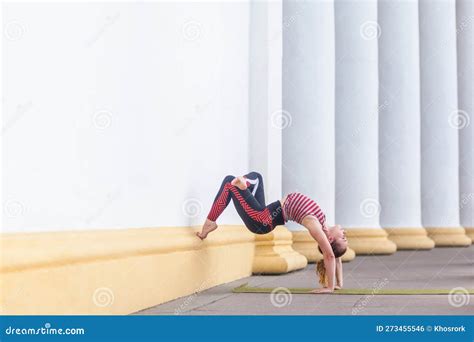 Athletic Beautiful Woman Wearing Sportswear Doing Wall Assisted