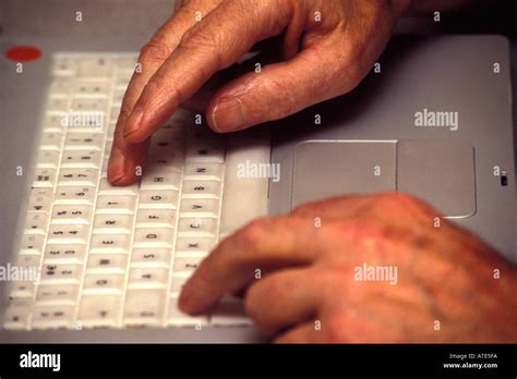 68 Year Old Man Using Computer Keyboard London England Stock Photo Alamy