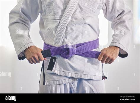 Im A Purple Belt Cropped Shot Of An Unrecognizable Man Tying A Purple