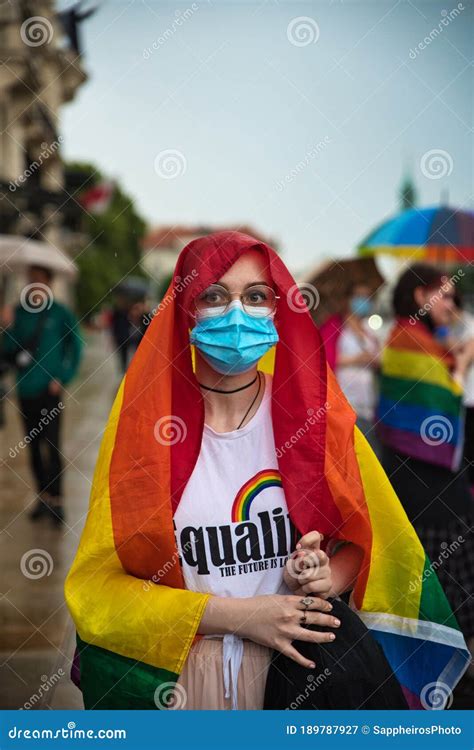 Lgbt Supporters Protesting On The Street With Banners And Rainbow Flags