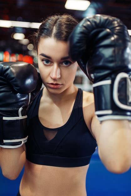 Premium Photo Woman In Black Boxing Gloves In The Ring Closeup Front