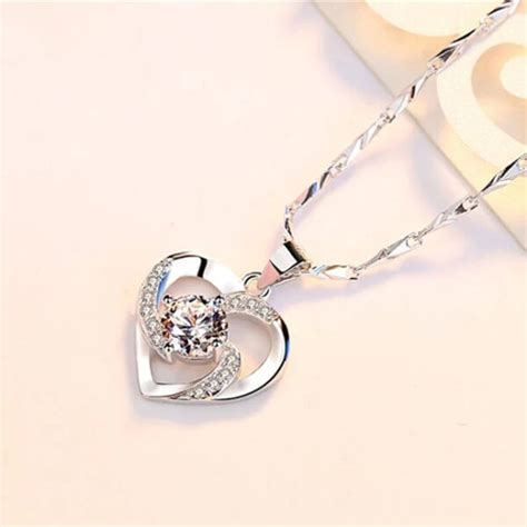 Round Cut Moissanite Solitaire Necklace With 4 Prongs