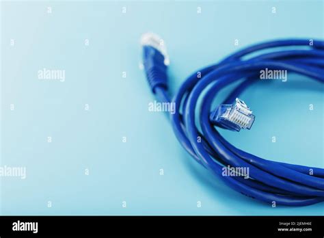Blue UTP Internet Cable Isolated On A Blue Background Ethernet Cord Stock Photo Alamy