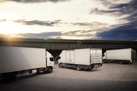 Trucks Parked Loading At Dock Warehouse Container Delivery Trucks