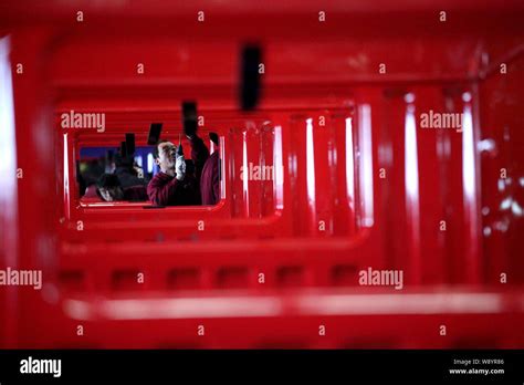 File A Chinese Worker Assembles A Car On The Assembly Line At The