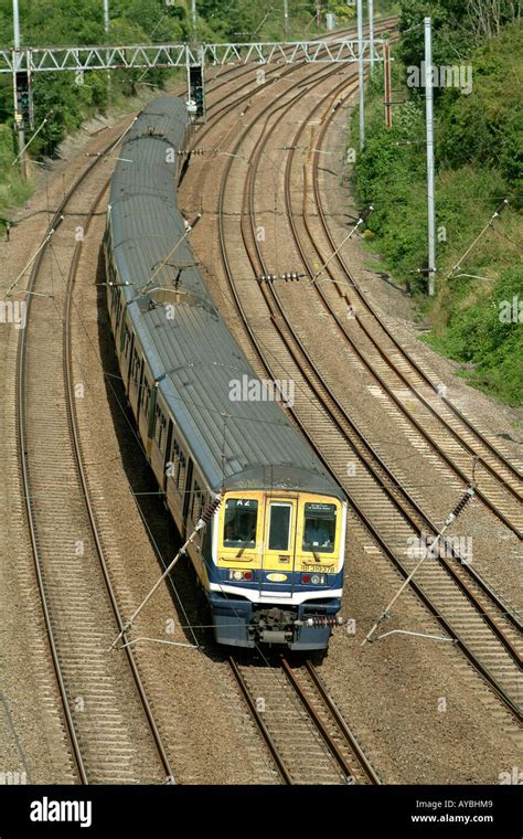 Thameslink Class 319 Train Travelling Through The British Countryside