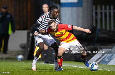 Partick Thistles Steven Lawless And Queens Parks Stephen Eze In