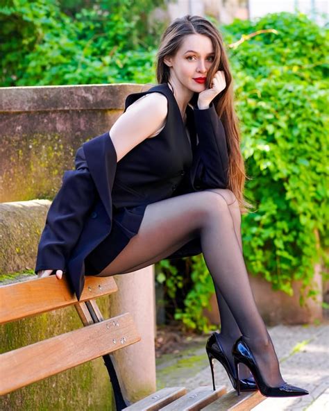 Black Mini Skirt With Grey Pantyhose And Coat On Bench Part 1 R