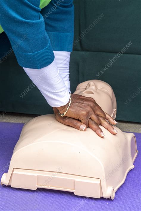 Woman Learning Cpr Stock Image C058 5721 Science Photo Library