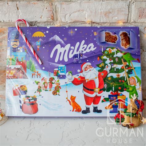 Купить Адвент календарь Milka c шоколадными фигурками и конфетами 200 г ...